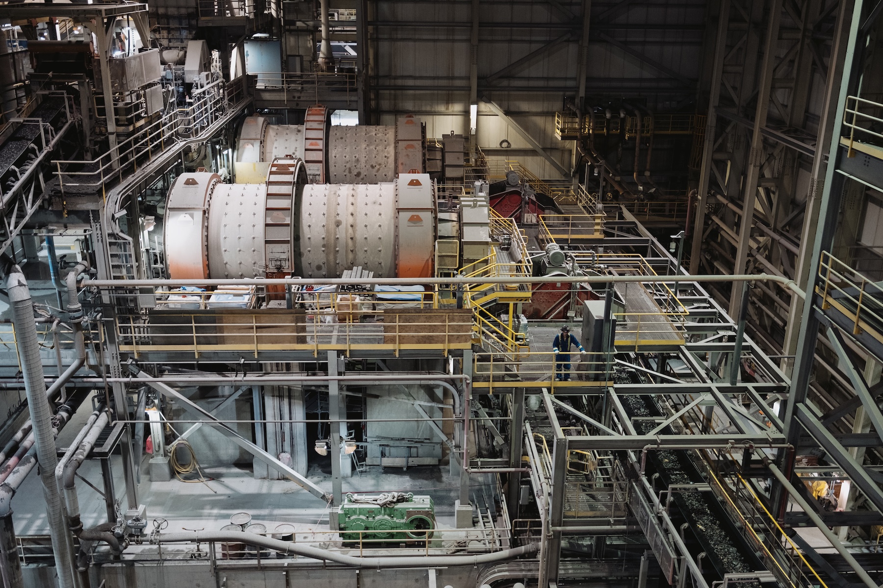Photo of the interior of a processing plant. Catwalks and large ...