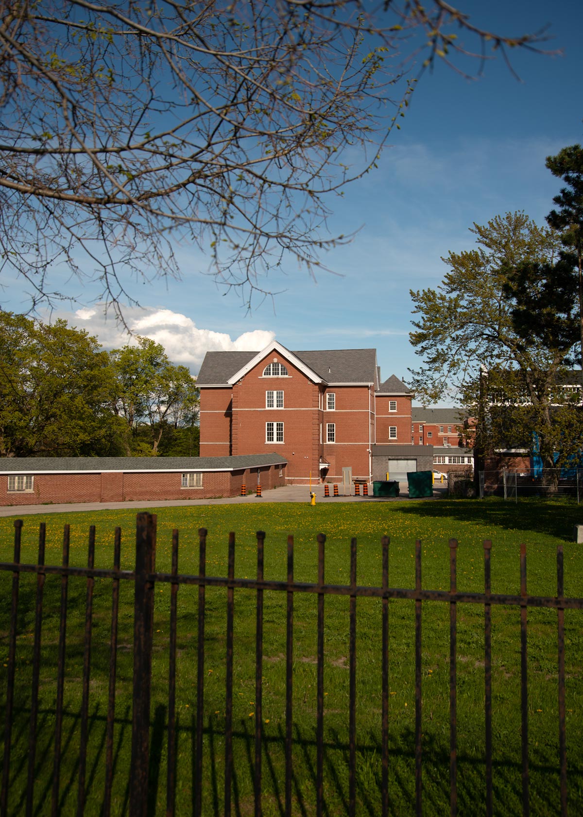 Photo of the Huronia Regional Centre. Red brick buildings are seen ...